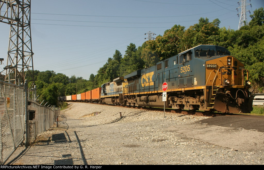 418 - CSXT 5205 leads today's edition of Q139, Q13927, past the power plant entrance